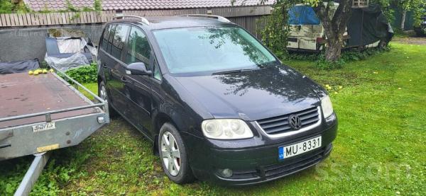 Melns Volkswagen Touran 2004 Rīga, ar dzinēja tilpumu 2.00 L un nobraukumu 466 tūkst. km par 2050 €, foto 5 vietnē AUTOMOTO.COM.LV