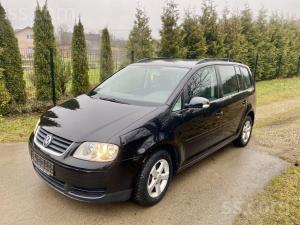 Melns Volkswagen Touran 2005 Rēzekne, ar dzinēja tilpumu 1.90 L un nobraukumu 349 tūkst. km par 2950 €, foto 2 vietnē AUTOMOTO.COM.LV