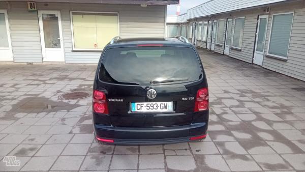 Black Volkswagen Touran 2005 in Vilnius, with an engine capacity of 2.00 L and mileage of 251 thousand km for 4950 €, photo 3 on AUTOMOTO.COM.LV
