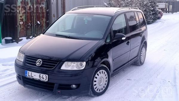 Black Volkswagen Touran 2005 in Cesis, with an engine capacity of 2.00 L and mileage of 314 thousand km for 2400 €, photo 1 on AUTOMOTO.COM.LV
