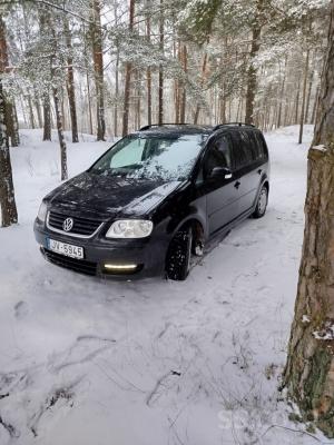 Black Volkswagen Touran 2005 in Riga, with an engine capacity of 2.00 L and mileage of 270 thousand km for 2700 €, photo  on AUTOMOTO.COM.LV