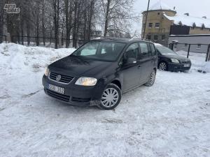 Melns Volkswagen Touran 2005 Šauļi, ar dzinēja tilpumu 1.90 L un nobraukumu 280 tūkst. km par 1399 €, foto  vietnē AUTOMOTO.COM.LV