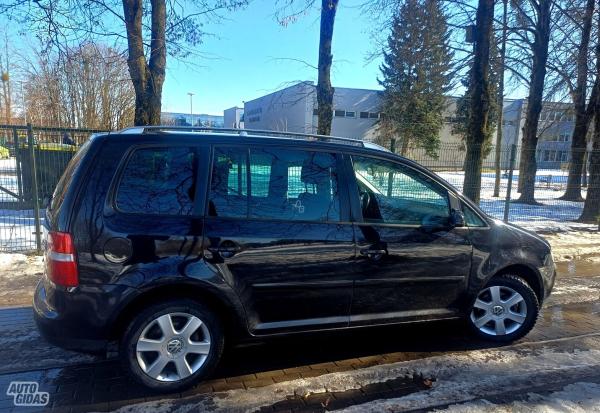 Melns Volkswagen Touran 2005 Kauņa, ar dzinēja tilpumu 2.00 L un nobraukumu 335 tūkst. km par 2450 €, foto 8 vietnē AUTOMOTO.COM.LV