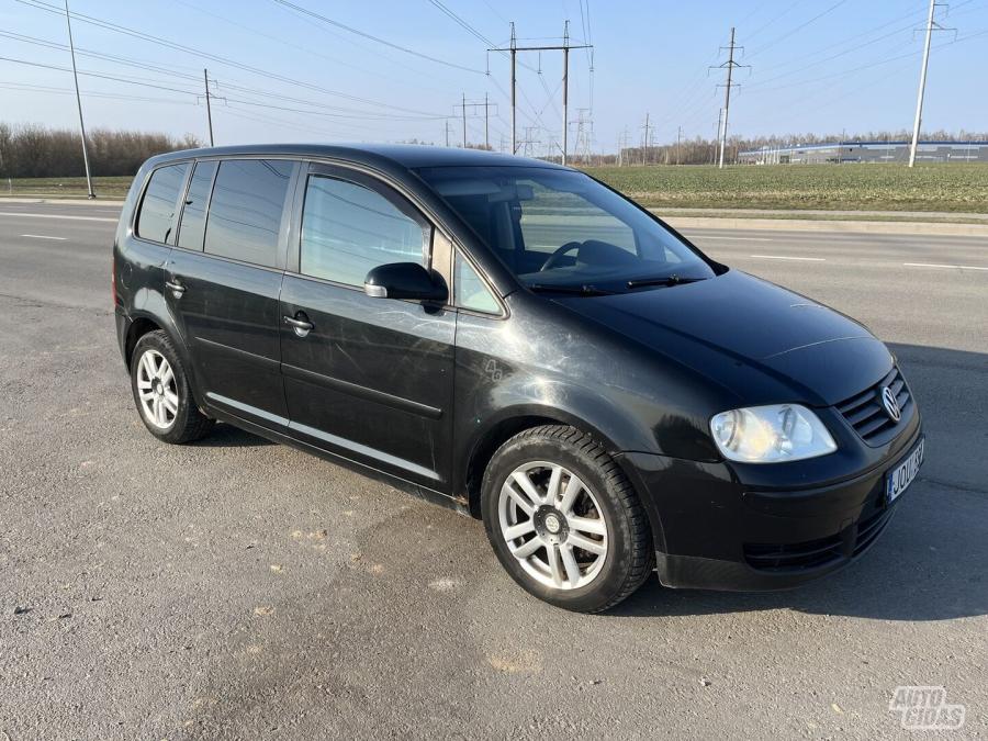 Melns Volkswagen Touran 2005 Panevēža, ar dzinēja tilpumu 1.90 L un nobraukumu 440 tūkst. km par 1100 €, foto 5 vietnē AUTOMOTO.COM.LV