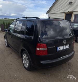 Melns Volkswagen Touran 2005 Marijampole, ar dzinēja tilpumu 2.00 L un nobraukumu 400 tūkst. km par 1450 €, foto 4 vietnē AUTOMOTO.COM.LV