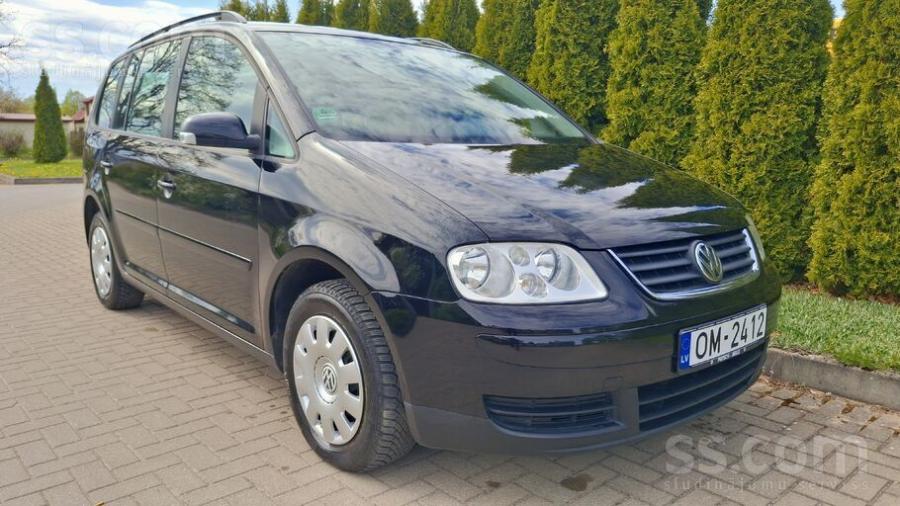 Melns Volkswagen Touran 2005 Valmiera, ar dzinēja tilpumu 1.90 L un nobraukumu 294 tūkst. km par 3100 €, foto 1 vietnē AUTOMOTO.COM.LV