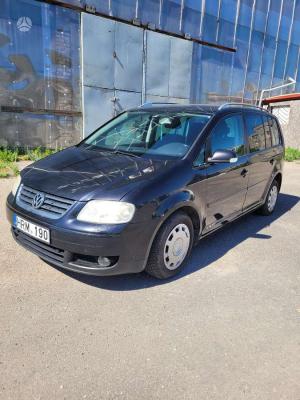 Black Volkswagen Touran 2005 in Klaipeda, with an engine capacity of 1.97 L and mileage of 336 thousand km for 1350 €, photo 3 on AUTOMOTO.COM.LV