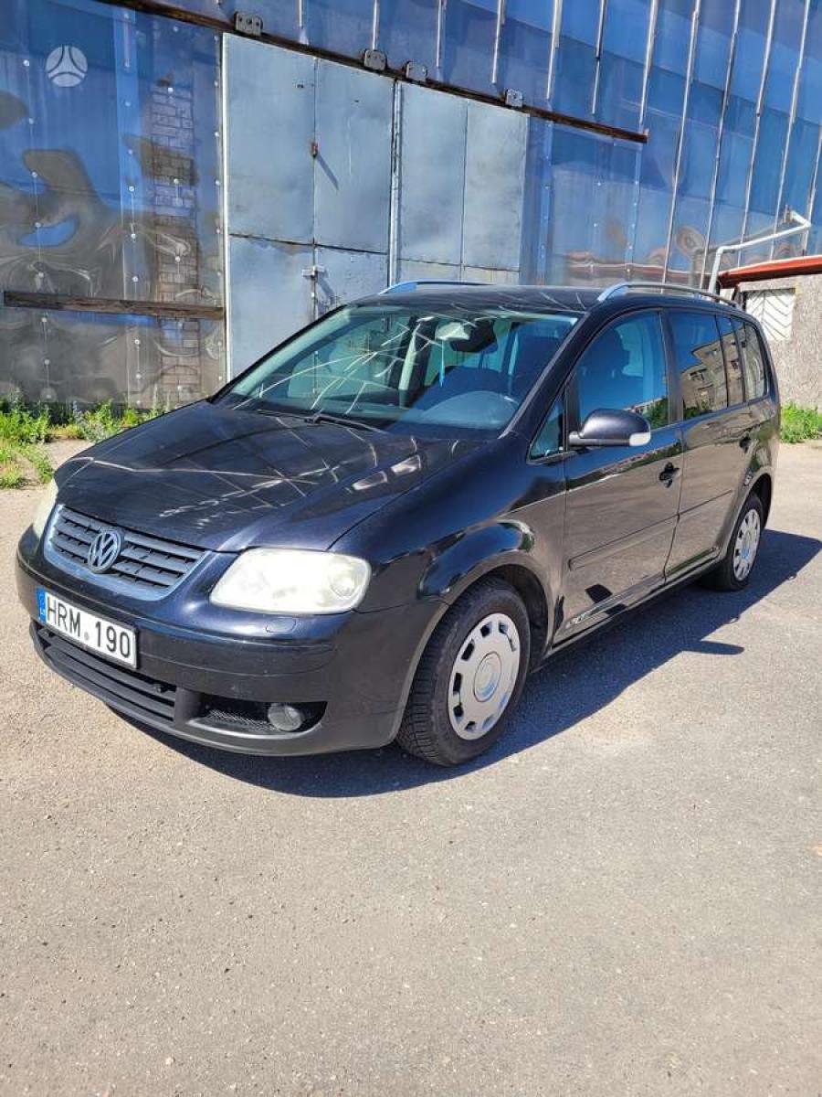 Black Volkswagen Touran 2005 in Klaipeda, with an engine capacity of 1.97 L and mileage of 336 thousand km for 1350 €, photo 3 on AUTOMOTO.COM.LV