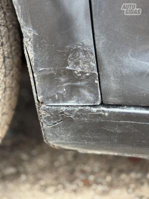 Melns Volkswagen Touran 2005 Klaipėda, ar dzinēja tilpumu 2.00 L un nobraukumu 345 tūkst. km par 1000 €, foto 8 vietnē AUTOMOTO.COM.LV