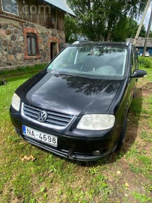 Black Volkswagen Touran 2005 in Riga, with an engine capacity of 2.00 L and mileage of 359 thousand km for 1200 €, photo 7 on AUTOMOTO.COM.LV