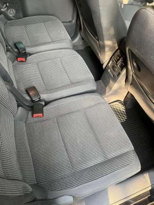 Black Volkswagen Touran 2005 in Kaunas, with an engine capacity of 1.97 L and mileage of 290 thousand km for 1950 €, photo 10 on AUTOMOTO.COM.LV