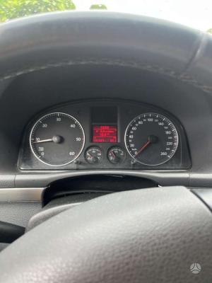 Black Volkswagen Touran 2005 in Kaunas, with an engine capacity of 1.97 L and mileage of 290 thousand km for 1950 €, photo 14 on AUTOMOTO.COM.LV