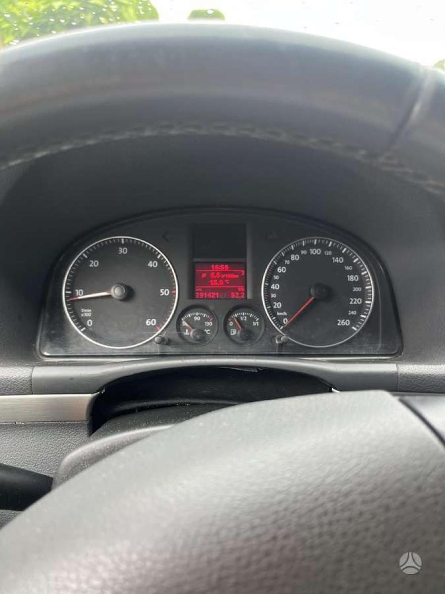 Black Volkswagen Touran 2005 in Kaunas, with an engine capacity of 1.97 L and mileage of 290 thousand km for 1950 €, photo 14 on AUTOMOTO.COM.LV
