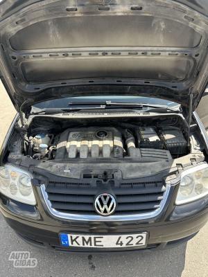 Melns Volkswagen Touran 2005 Kauņa, ar dzinēja tilpumu 1.90 L un nobraukumu 328 tūkst. km par 800 €, foto 32 vietnē AUTOMOTO.COM.LV