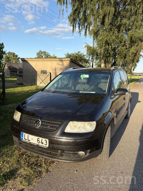 Melns Volkswagen Touran 2005 Balvi, ar dzinēja tilpumu 2.00 L un nobraukumu 315 tūkst. km par 1500 €, foto 1 vietnē AUTOMOTO.COM.LV