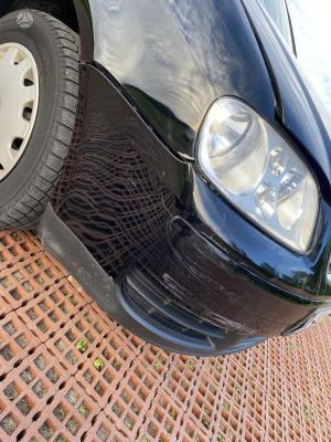 Black Volkswagen Touran 2005 in Kaunas, with an engine capacity of 1.90 L and mileage of 400 thousand km for 1449 €, photo 14 on AUTOMOTO.COM.LV