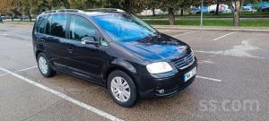 Black Volkswagen Touran 2005 in Riga, with an engine capacity of 2.00 L and mileage of 259 thousand km for 2150 €, photo 3 on AUTOMOTO.COM.LV