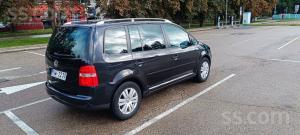 Black Volkswagen Touran 2005 in Riga, with an engine capacity of 2.00 L and mileage of 259 thousand km for 2150 €, photo 4 on AUTOMOTO.COM.LV