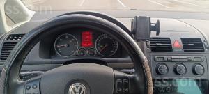 Black Volkswagen Touran 2005 in Riga, with an engine capacity of 2.00 L and mileage of 259 thousand km for 2150 €, photo 8 on AUTOMOTO.COM.LV