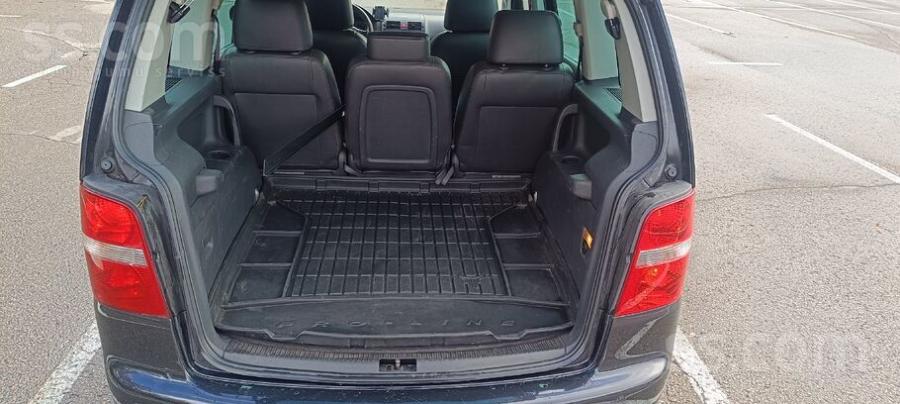 Black Volkswagen Touran 2005 in Riga, with an engine capacity of 2.00 L and mileage of 259 thousand km for 2150 €, photo 11 on AUTOMOTO.COM.LV