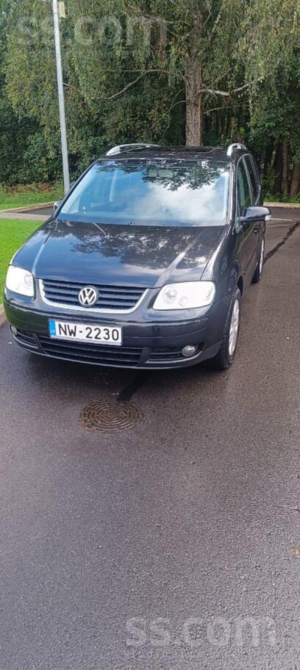 Melns Volkswagen Touran 2005 Rīga, ar dzinēja tilpumu 2.00 L un nobraukumu 259 tūkst. km par 2150 €, foto 1 vietnē AUTOMOTO.COM.LV