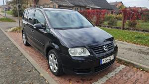 Melns Volkswagen Touran 2005 Daugavpils, ar dzinēja tilpumu 1.90 L un nobraukumu 348 tūkst. km par 1400 €, foto 3 vietnē AUTOMOTO.COM.LV