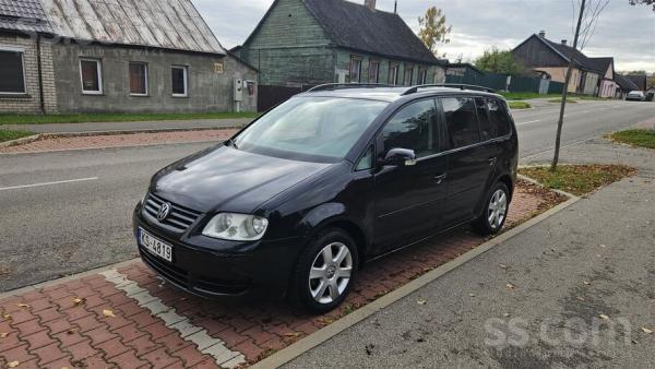 Volkswagen Touran 2005 Daugavpils vietnē Melns Volkswagen Touran 2005 Daugavpils, ar dzinēja tilpumu 1.90 L un nobraukumu 348 tūkst. km par 1400 €, foto 4 vietnē AUTOMOTO.COM.LV
