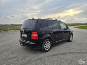 Melns Volkswagen Touran 2005 Plungė, ar dzinēja tilpumu 1.90 L un nobraukumu 308 tūkst. km par 700 €, foto 6 vietnē AUTOMOTO.COM.LV