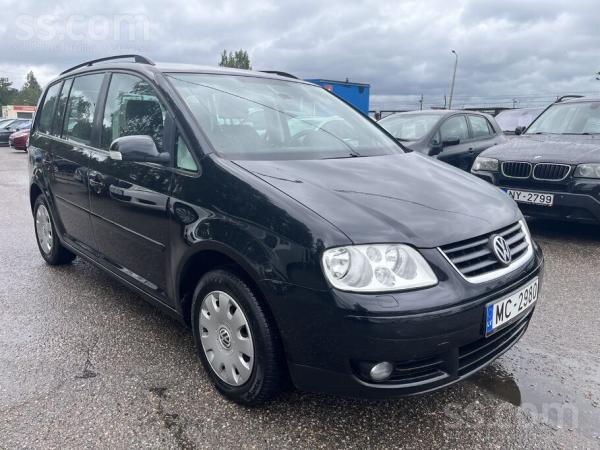 Black Volkswagen Touran 2006 in Riga, with an engine capacity of 2.00 L and mileage of 0 thousand km for 2450 €, photo 8 on AUTOMOTO.COM.LV