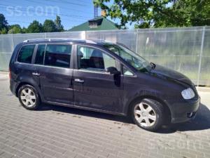 Black Volkswagen Touran 2006 in Riga, with an engine capacity of 2.00 L and mileage of 298 thousand km for 1150 €, photo 3 on AUTOMOTO.COM.LV