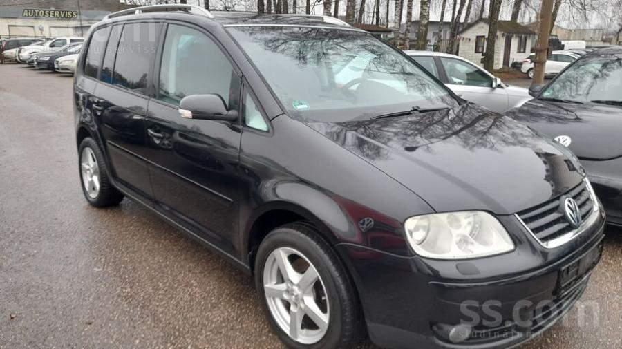 Black Volkswagen Touran 2006 in Riga, with an engine capacity of 1.90 L and mileage of 228 thousand km for 4100 €, photo 3 on AUTOMOTO.COM.LV