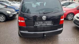 Black Volkswagen Touran 2006 in Riga, with an engine capacity of 1.90 L and mileage of 228 thousand km for 4100 €, photo 7 on AUTOMOTO.COM.LV