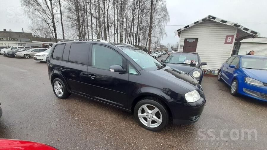 Black Volkswagen Touran 2006 in Riga, with an engine capacity of 1.90 L and mileage of 228 thousand km for 4100 €, photo 11 on AUTOMOTO.COM.LV