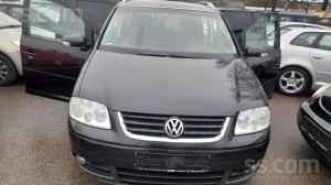 Black Volkswagen Touran 2006 in Riga, with an engine capacity of 1.90 L and mileage of 228 thousand km for 4100 €, photo 25 on AUTOMOTO.COM.LV