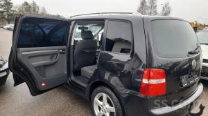 Black Volkswagen Touran 2006 in Riga, with an engine capacity of 1.90 L and mileage of 228 thousand km for 4100 €, photo 27 on AUTOMOTO.COM.LV