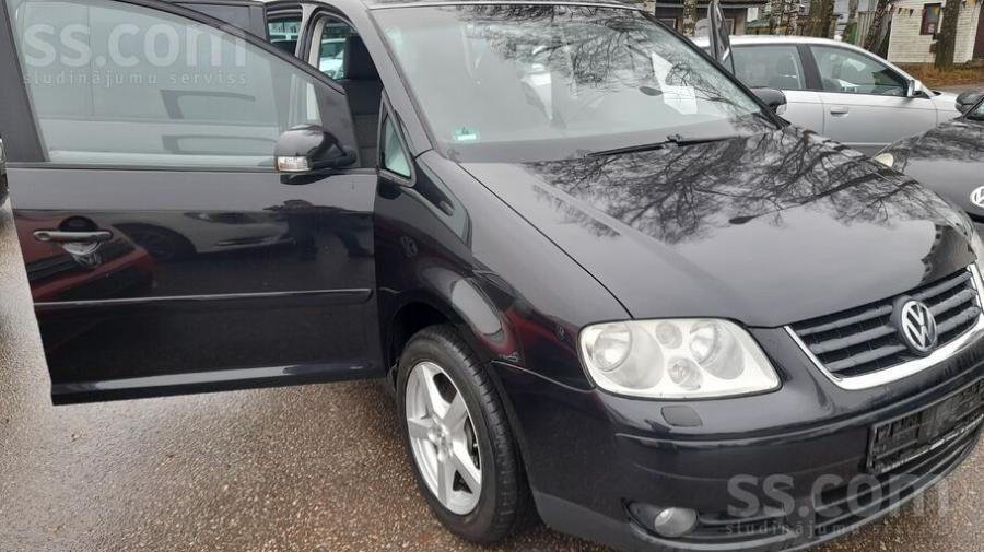 Black Volkswagen Touran 2006 in Riga, with an engine capacity of 1.90 L and mileage of 228 thousand km for 4100 €, photo 35 on AUTOMOTO.COM.LV