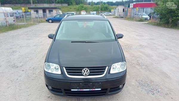 Black Volkswagen Touran 2006 in Vilnius, with an engine capacity of 2.00 L and mileage of 193 thousand km for 4550 €, photo 1 on AUTOMOTO.COM.LV