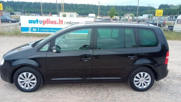 Black Volkswagen Touran 2006 in Vilnius, with an engine capacity of 2.00 L and mileage of 193 thousand km for 4550 €, photo 2 on AUTOMOTO.COM.LV
