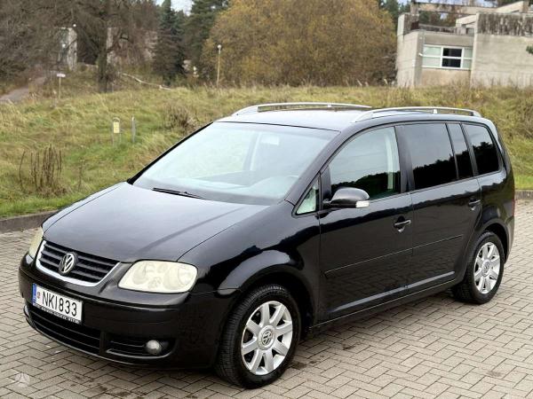 Black Volkswagen Touran 2006 in Vilnius, with an engine capacity of 1.90 L and mileage of 299 thousand km for 2000 €, photo 2 on AUTOMOTO.COM.LV
