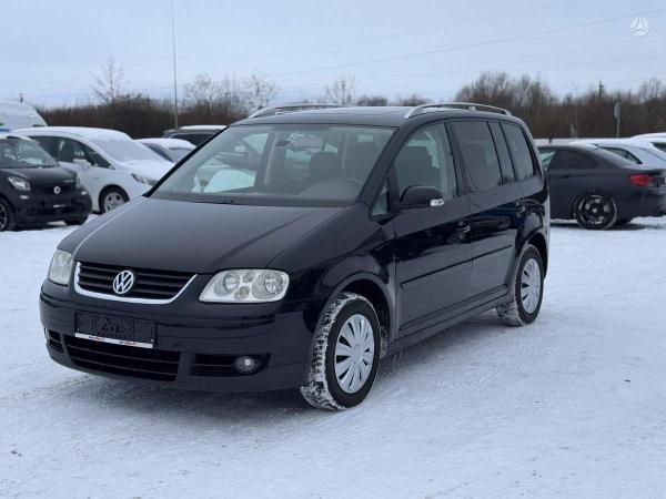 Black Volkswagen Touran 2006 in Siauliai, with an engine capacity of 1.97 L and mileage of 196 thousand km for 2550 €, photo 1 on AUTOMOTO.COM.LV