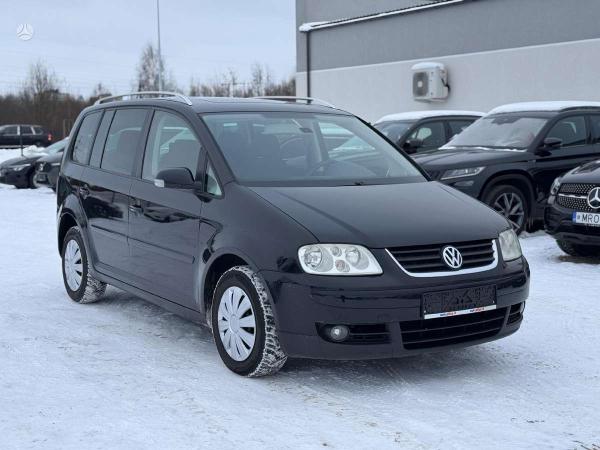 Black Volkswagen Touran 2006 in Siauliai, with an engine capacity of 1.97 L and mileage of 196 thousand km for 2550 €, photo 3 on AUTOMOTO.COM.LV