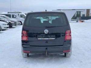 Black Volkswagen Touran 2006 in Siauliai, with an engine capacity of 1.97 L and mileage of 196 thousand km for 2550 €, photo 5 on AUTOMOTO.COM.LV