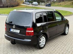 Black Volkswagen Touran 2006 in Vilnius, with an engine capacity of 1.90 L and mileage of 286 thousand km for 1900 €, photo 4 on AUTOMOTO.COM.LV