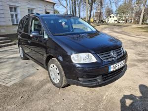 Black Volkswagen Touran 2006 in Utena, with an engine capacity of 1.60 L and mileage of 204 thousand km for 2200 €, photo 2 on AUTOMOTO.COM.LV