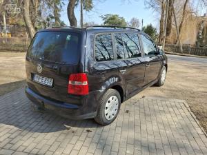 Black Volkswagen Touran 2006 in Utena, with an engine capacity of 1.60 L and mileage of 204 thousand km for 2200 €, photo 5 on AUTOMOTO.COM.LV