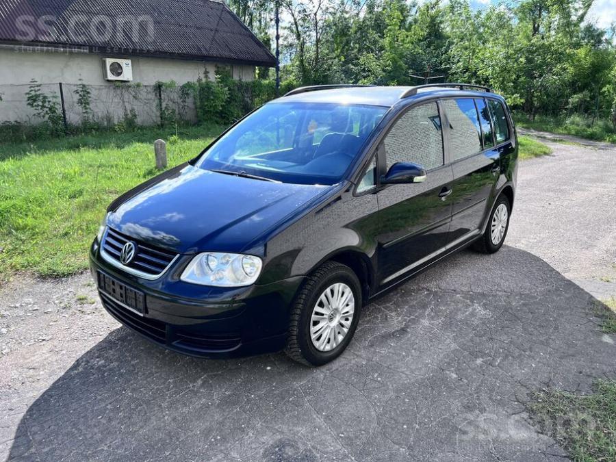 Black Volkswagen Touran 2006 in Daugavpils, with an engine capacity of 1.90 L and mileage of 287 thousand km for 2649 €, photo 1 on AUTOMOTO.COM.LV