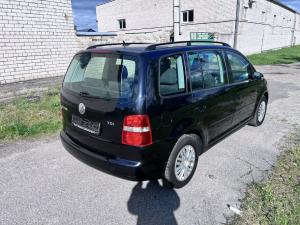 Black Volkswagen Touran 2006 in Daugavpils, with an engine capacity of 1.90 L and mileage of 287 thousand km for 2649 €, photo 5 on AUTOMOTO.COM.LV