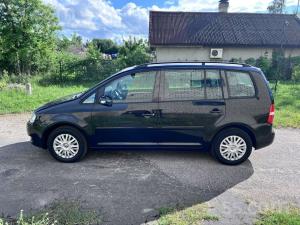Black Volkswagen Touran 2006 in Daugavpils, with an engine capacity of 1.90 L and mileage of 287 thousand km for 2649 €, photo 6 on AUTOMOTO.COM.LV