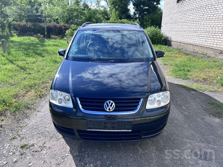 Black Volkswagen Touran 2006 in Daugavpils, with an engine capacity of 1.90 L and mileage of 287 thousand km for 2649 €, photo 8 on AUTOMOTO.COM.LV