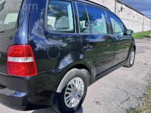 Black Volkswagen Touran 2006 in Daugavpils, with an engine capacity of 1.90 L and mileage of 287 thousand km for 2649 €, photo 13 on AUTOMOTO.COM.LV